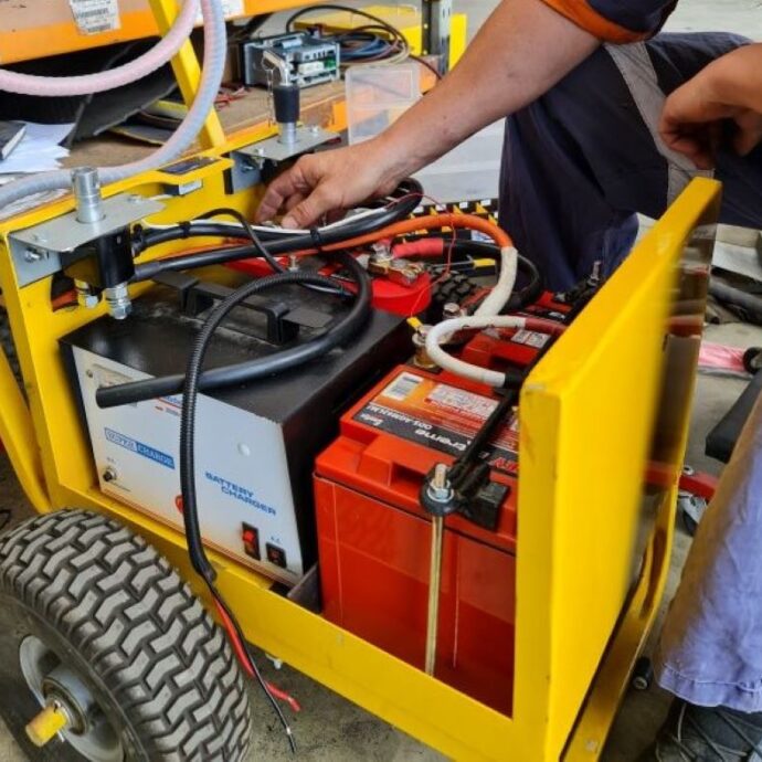 Repair and servicing of TRUCKS, BUSES, TRAILERS